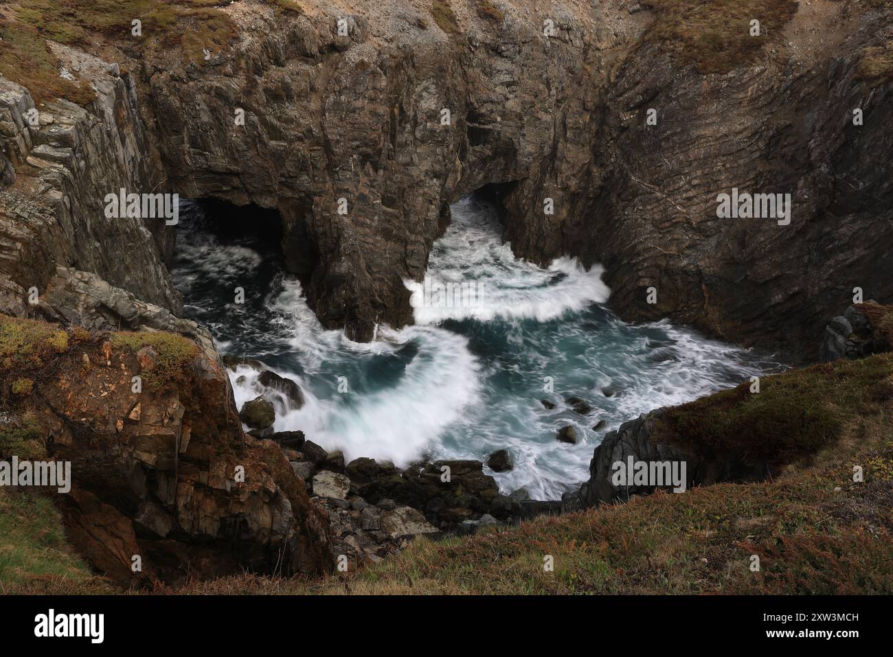 Sea caves and arches at Dungeon Provincial Park near Bonavista ...