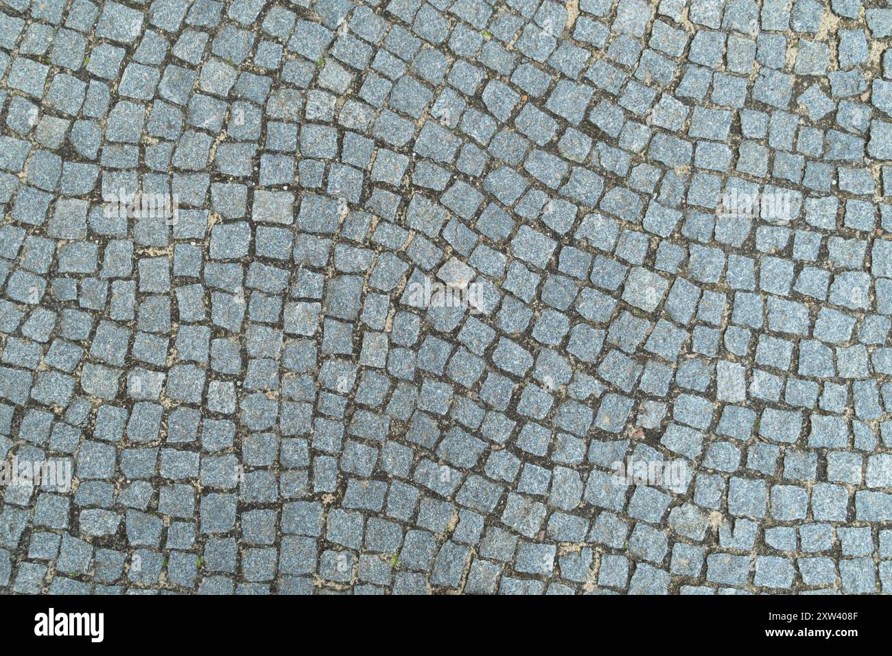 Pedestrian path with small square stones. Backgrounds and textures ...