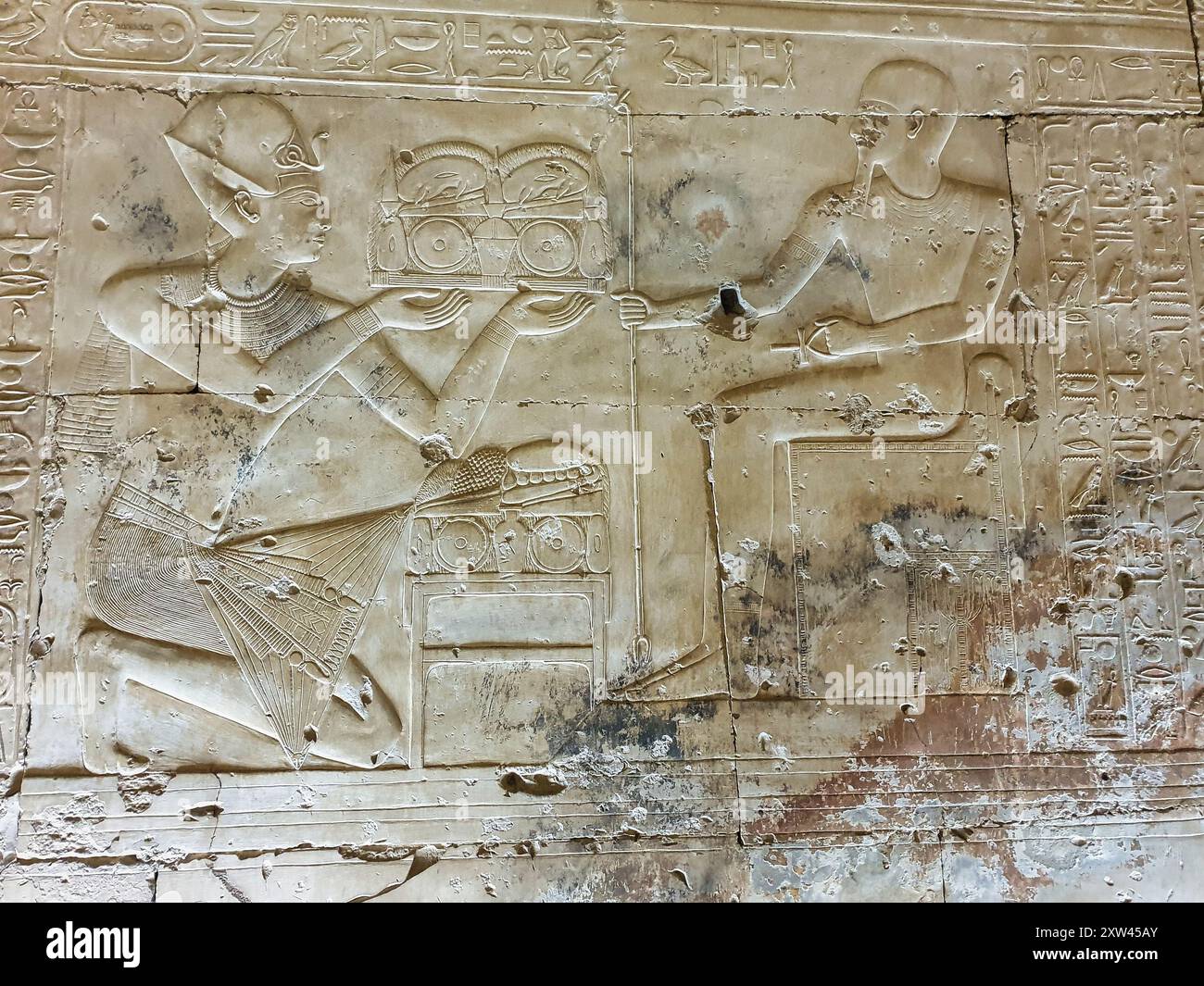 Pharoah Seti I makes offerings of fruits and flowers to the god Ptah of ...