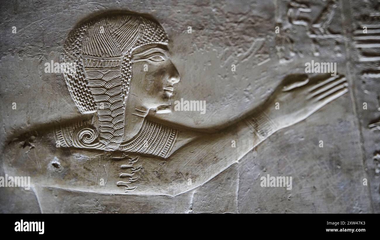 Close up with bokeh focus on the face of Ramesses II as a prince in this wall relief in the ...