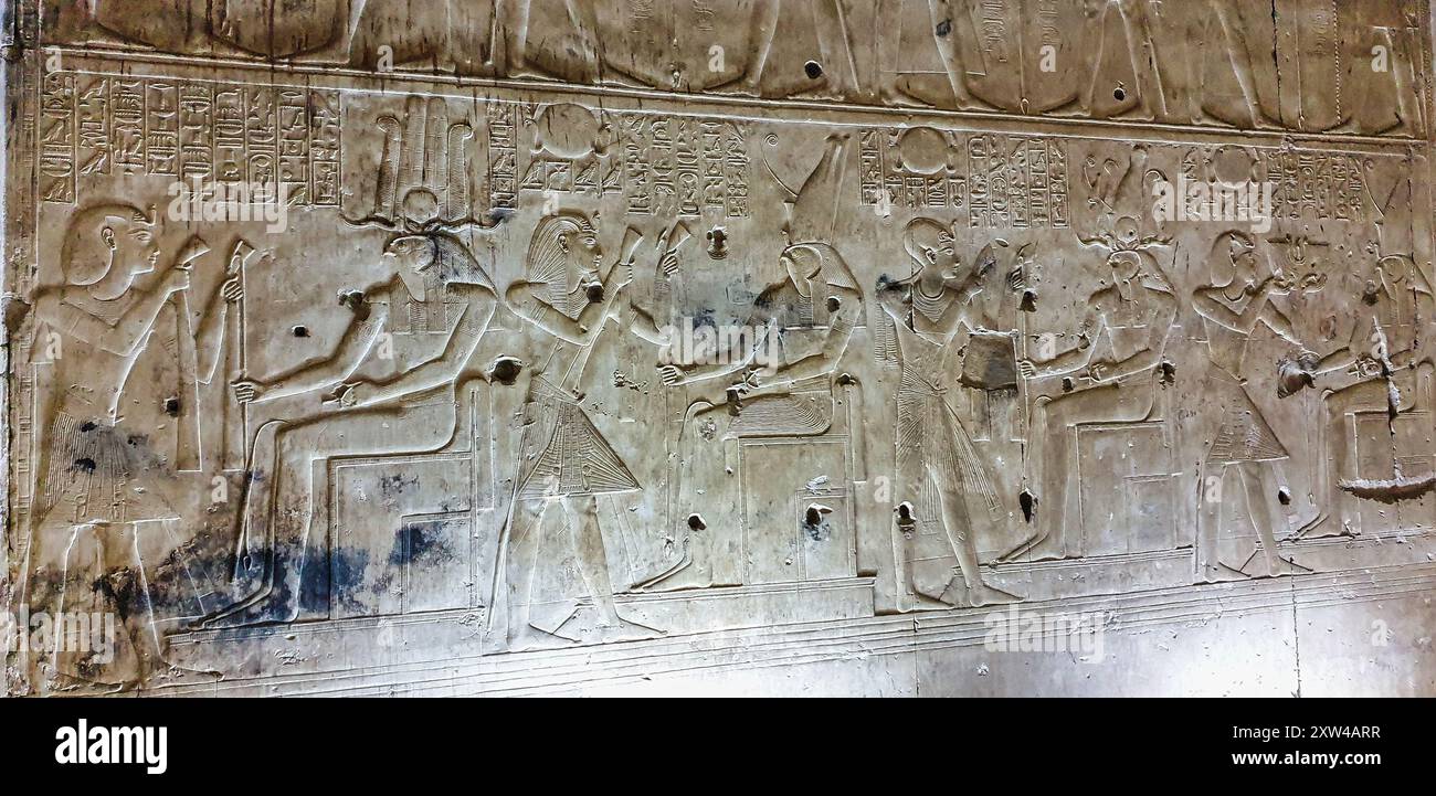 Pharoah Seti I makes offerings to different forms of God Horus in the ...