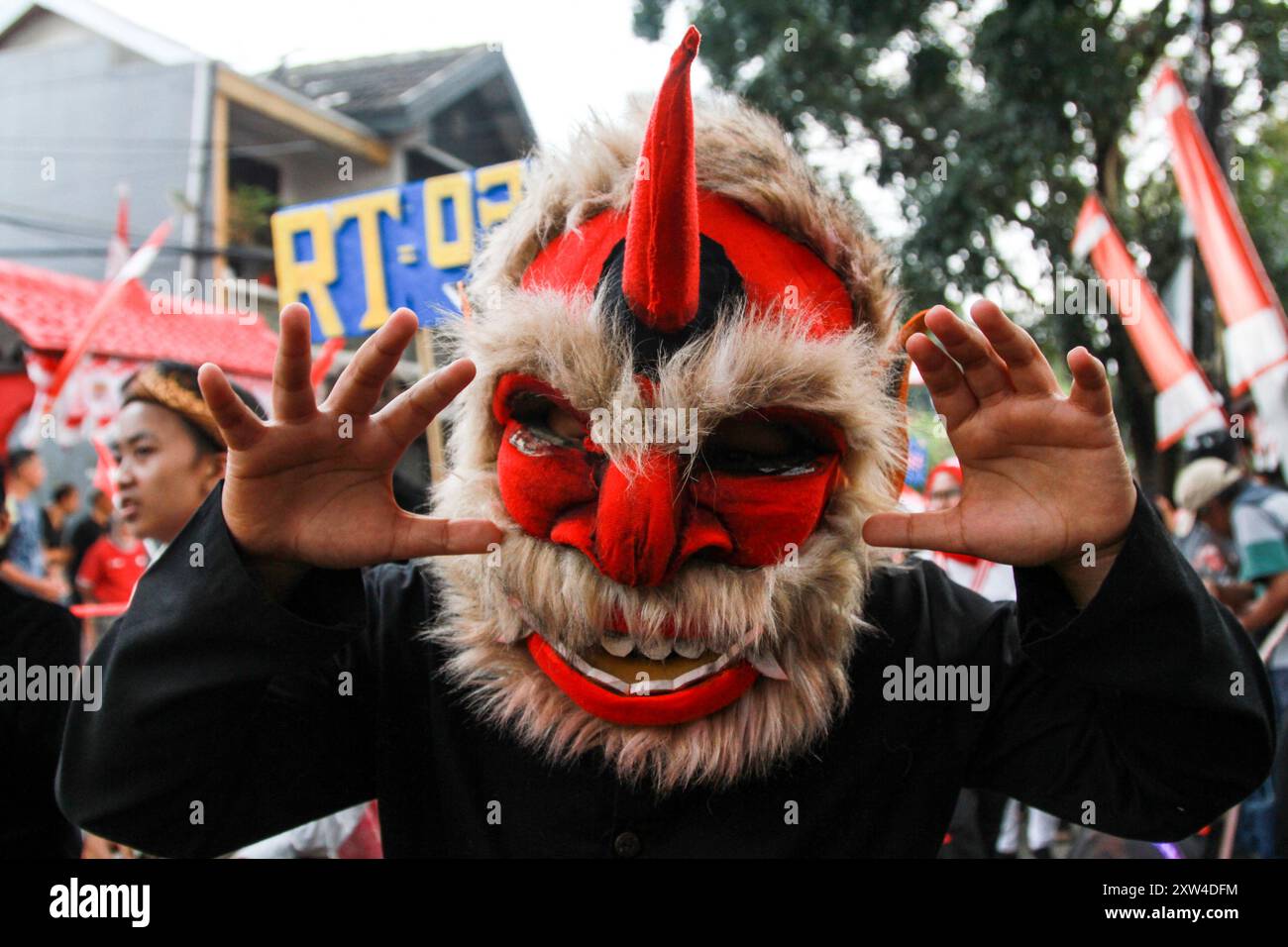 Bandung, West Java, Indonesia. 17th Aug, 2024. A child wearing a 'devil ...