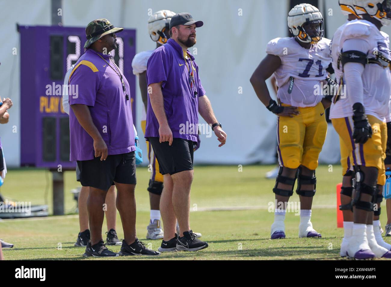 August 17, 2024: LSU offensive line coach Brad Davis puts his group ...