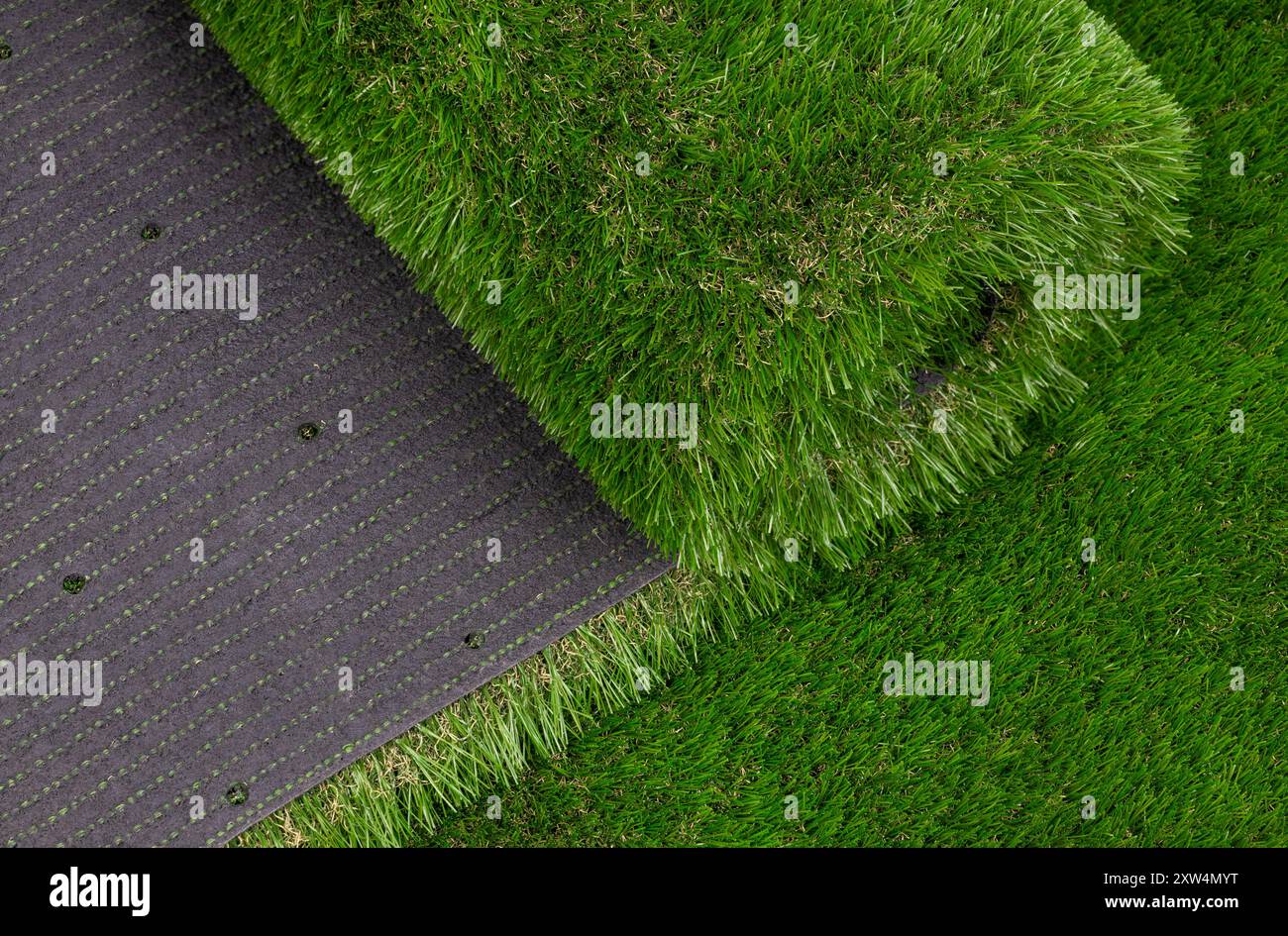 Artificial Grass Roll Displaying Backing and Texture Stock Photo - Alamy
