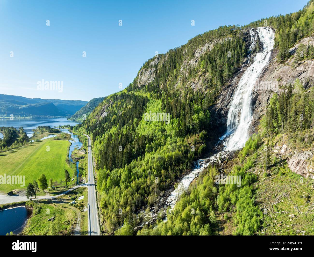 Aerial view of waterfall Reiarsfoss at lake Bygdlandsfjord, Setesdal ...