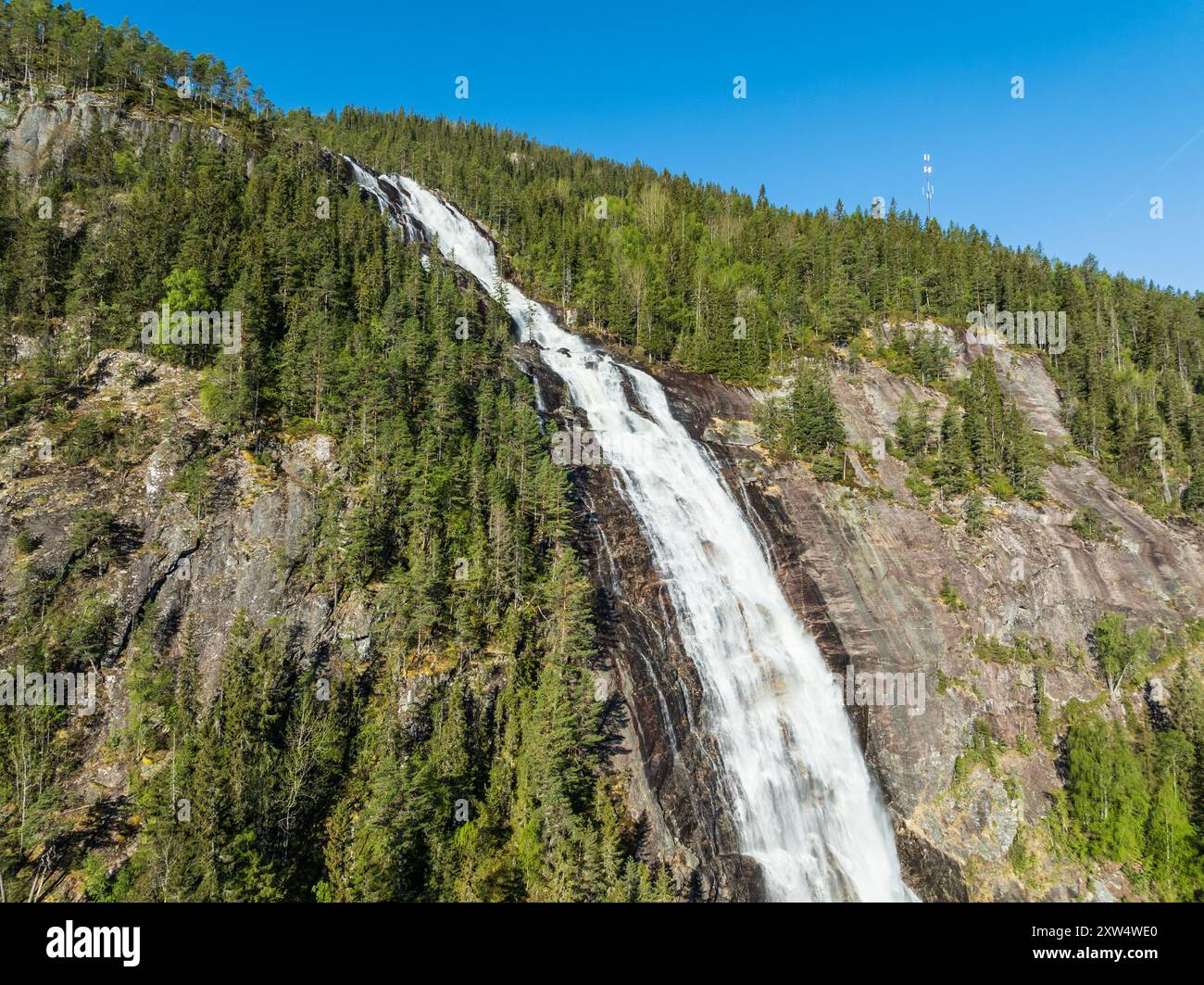Aerial view of waterfall Reiarsfoss at lake Bygdlandsfjord, Setesdal ...