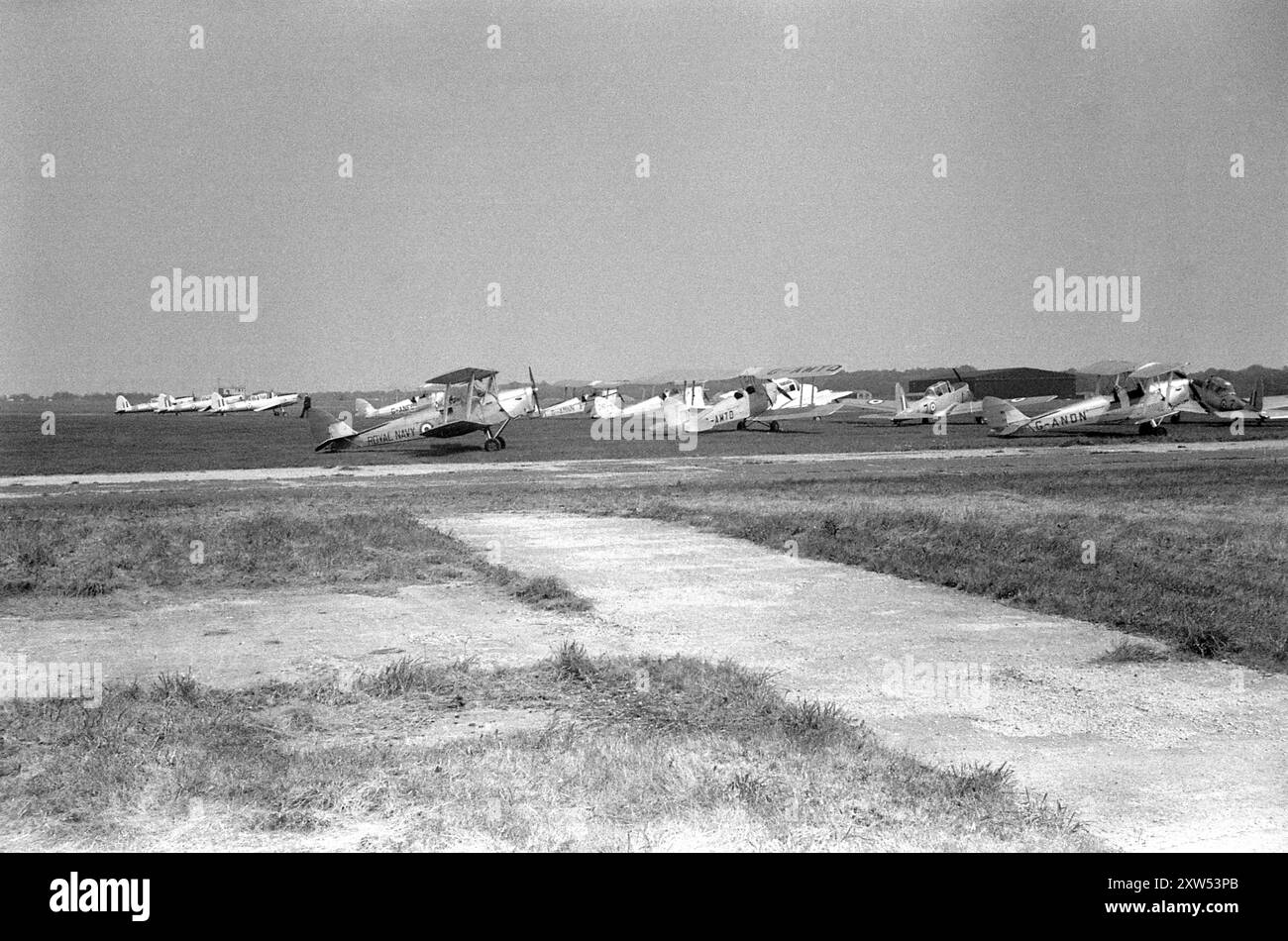 England. circa.1957 – A group of de Havilland DH.82 Tiger Moth and ...