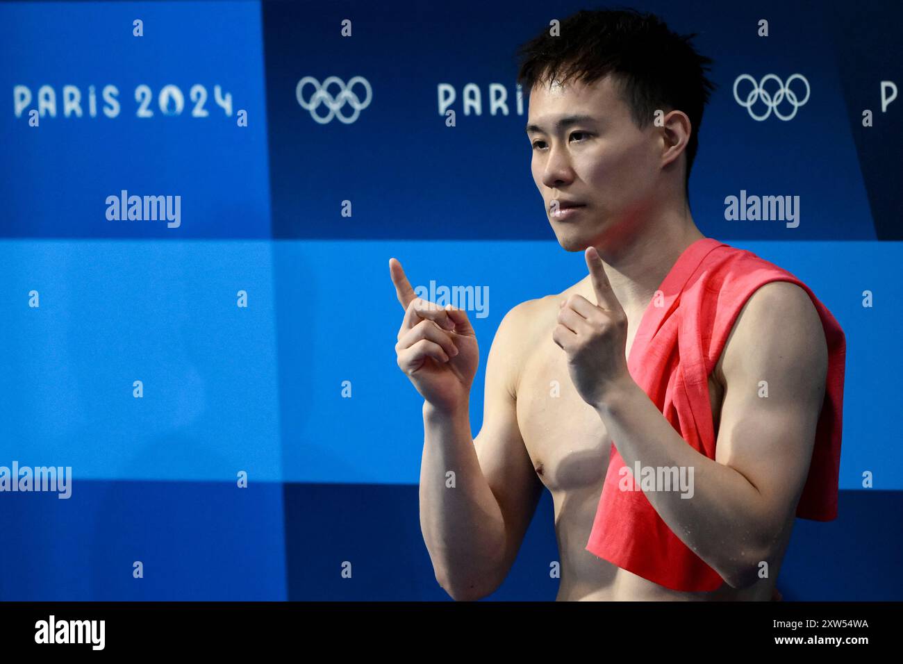 Siyi Xie of China celebrates after winning the gold medal in the diving ...