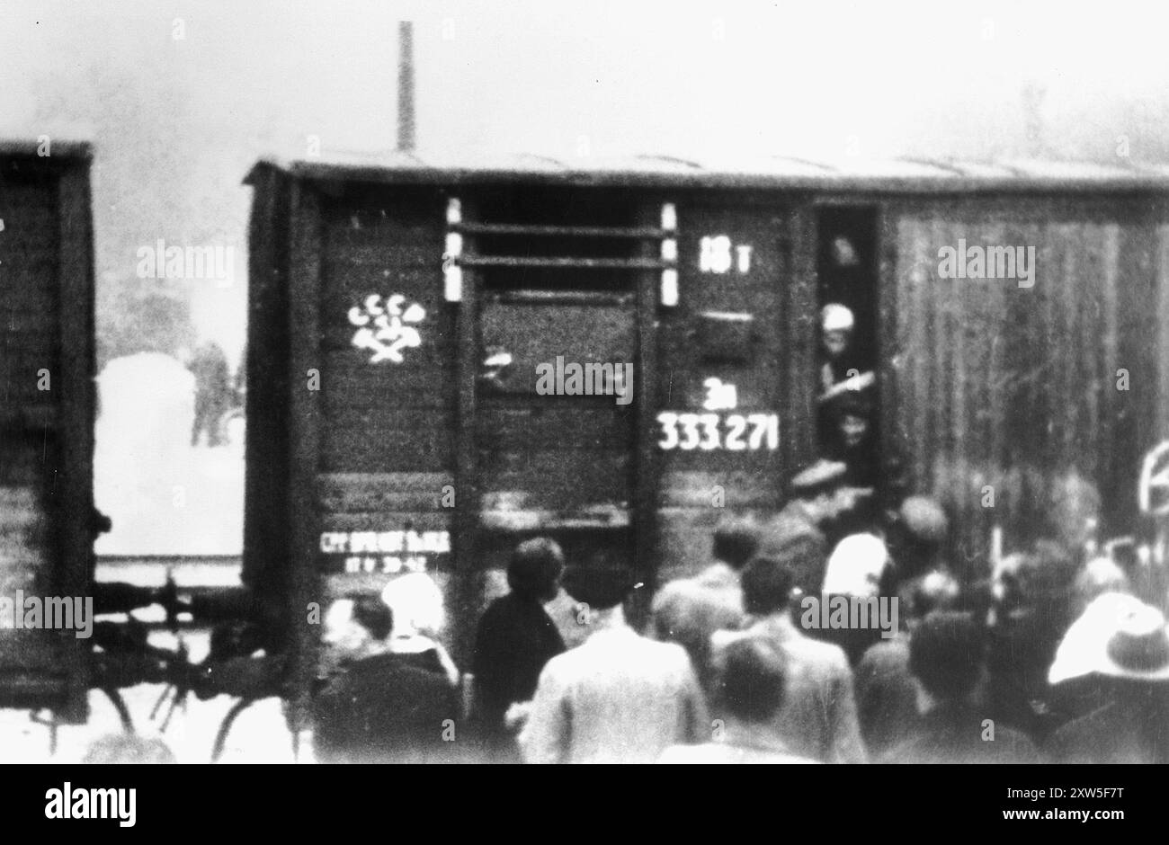 Soviet deportees boarding a train for their destinations in the Gulags ...