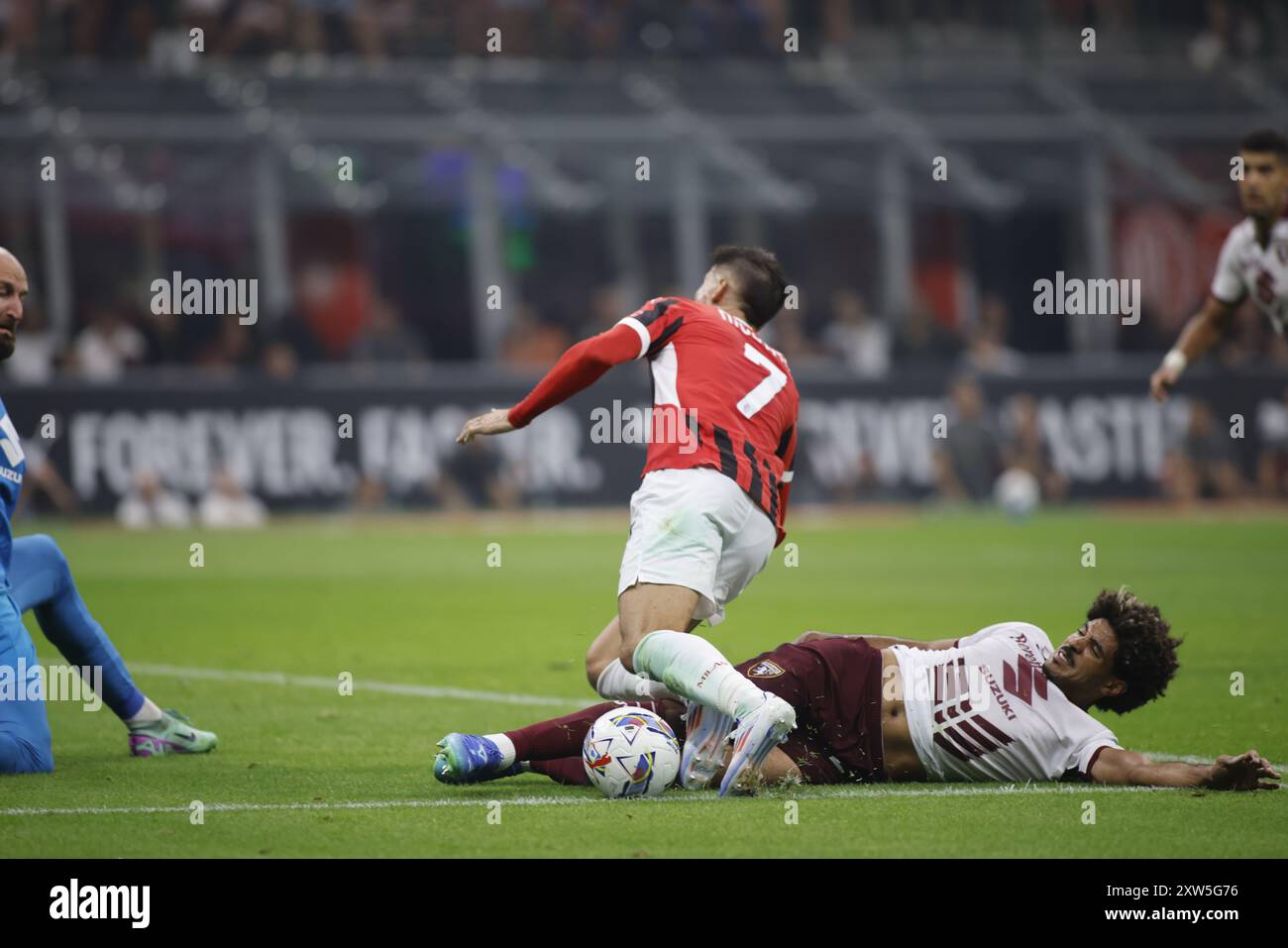 Alvaro Morata of AC Milan and Saul Coco of Torino FC during the Italian ...