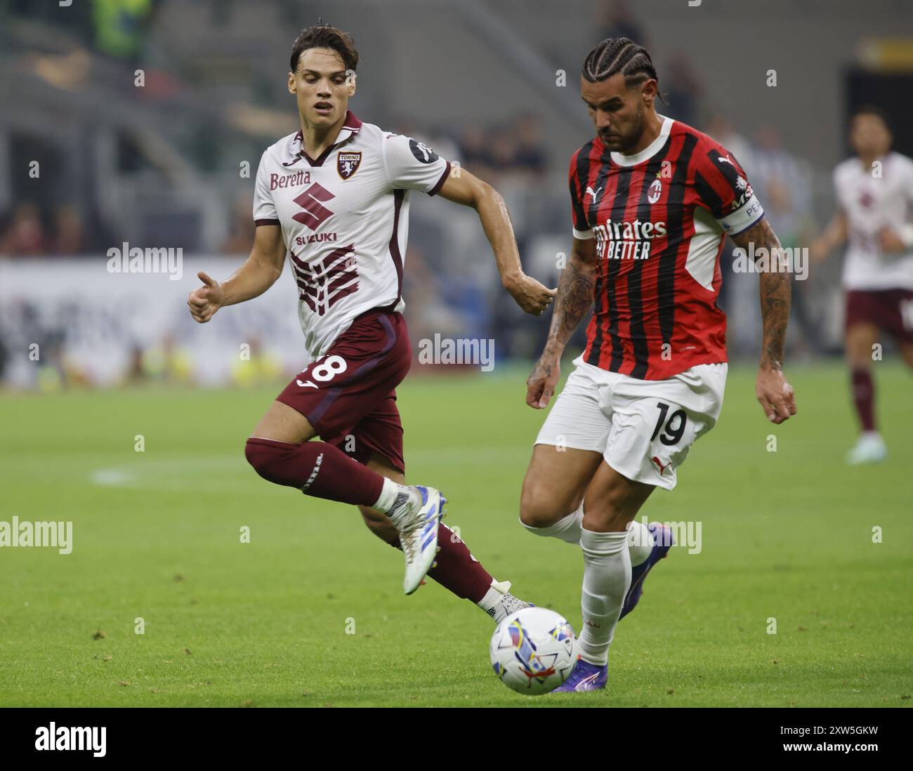 Theo Hernandez of AC Milan and Samuele Ricci of Torino FC during the ...