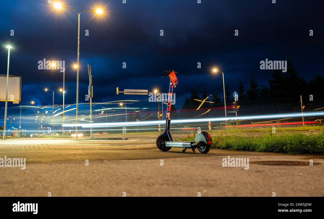 Tuul rental e-scooter at night in Tallinn, Estonia Stock Photo - Alamy