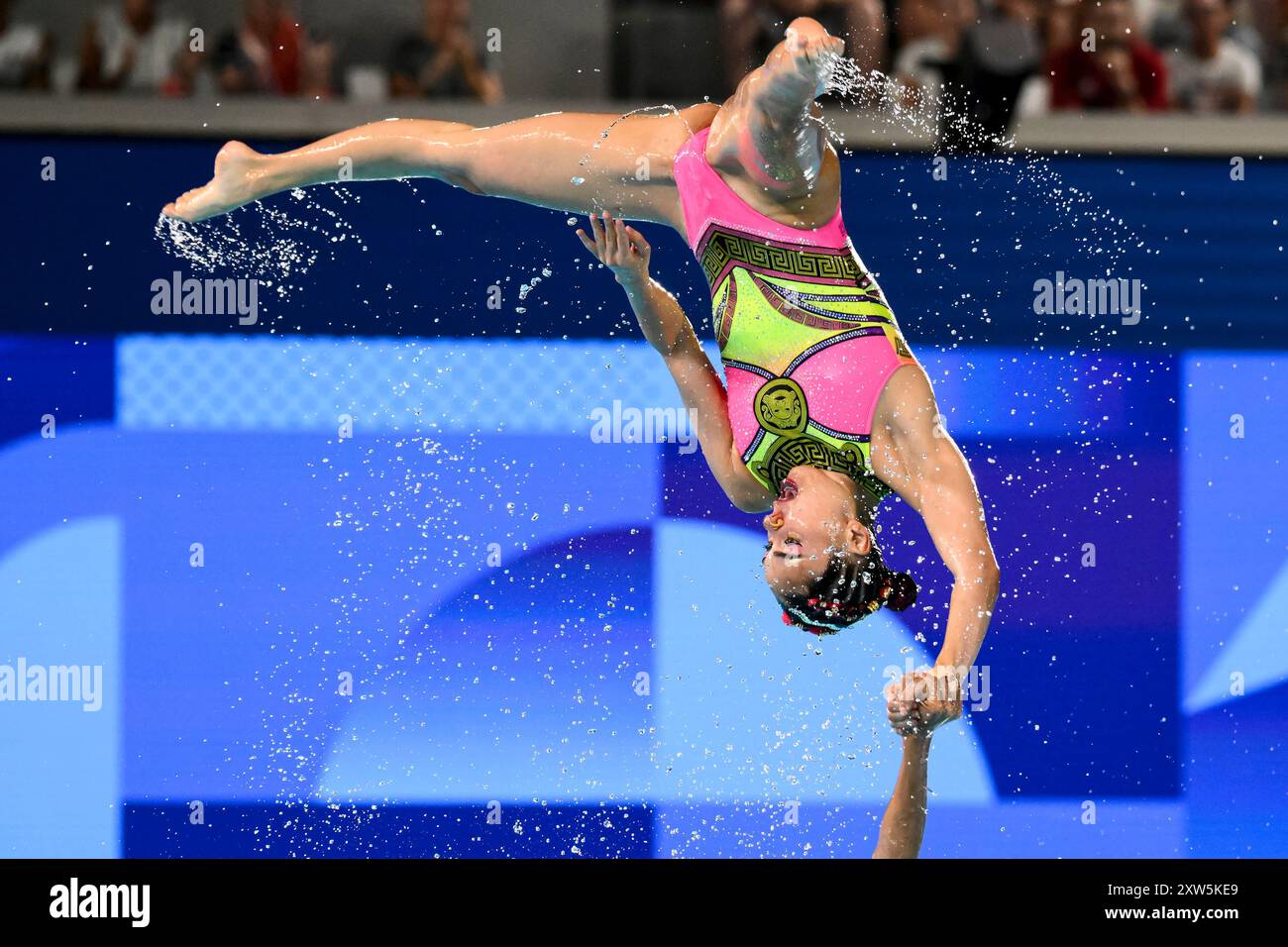 Athletes of team Mexico compete in the artistic swimming Team Acrobatic ...
