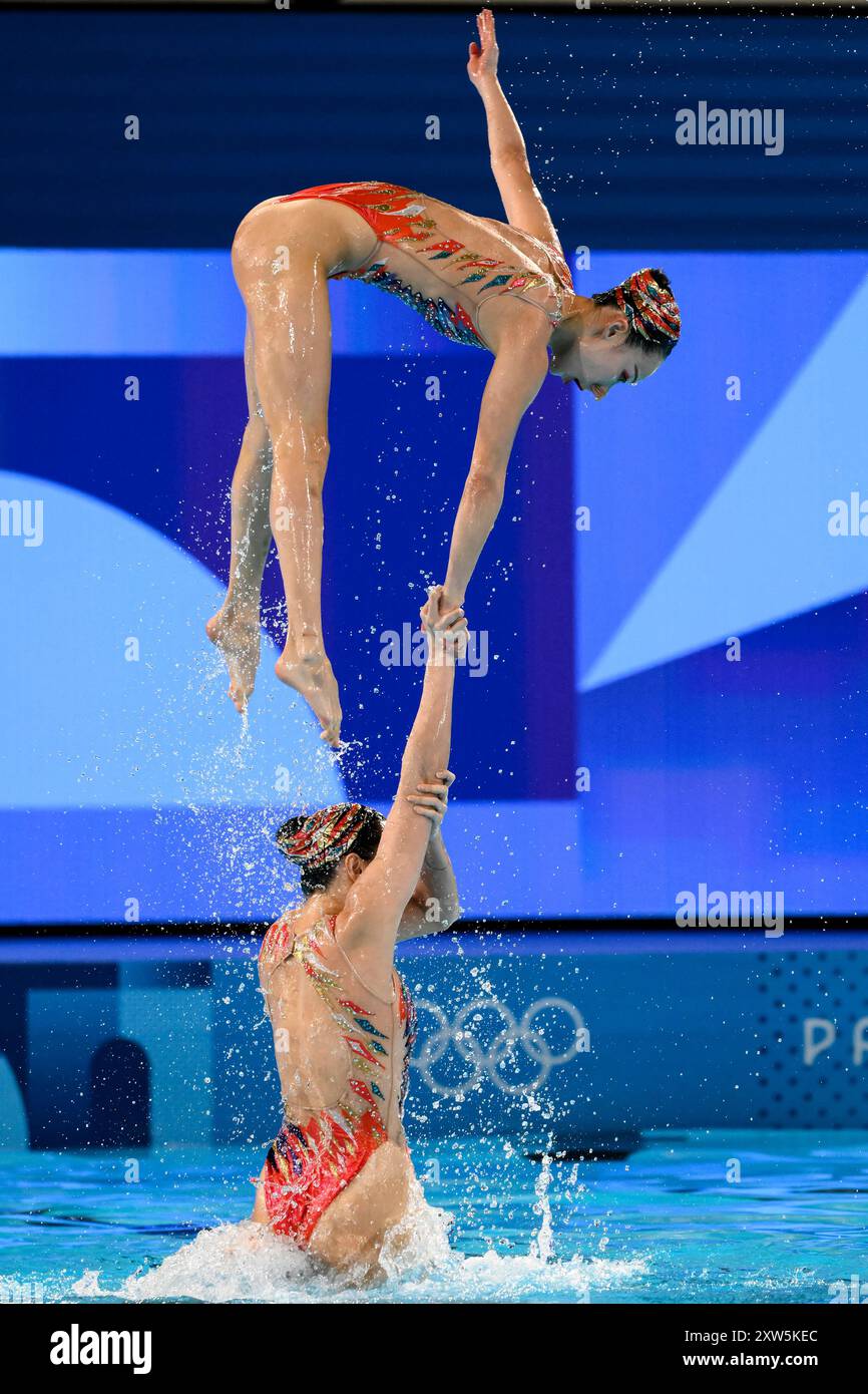 Athletes of team China compete in the artistic swimming Team Acrobatic ...