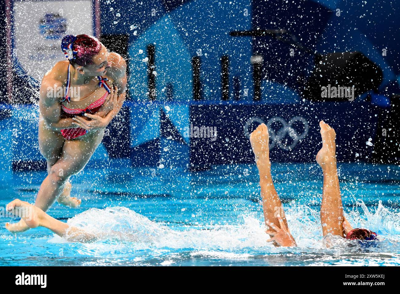 Athletes of team France compete in the artistic swimming Team Acrobatic ...