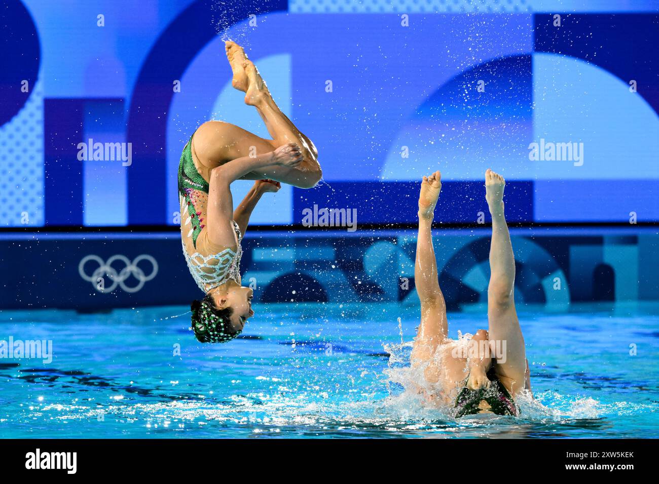 Athletes of team Japan compete in the artistic swimming Team Acrobatic ...