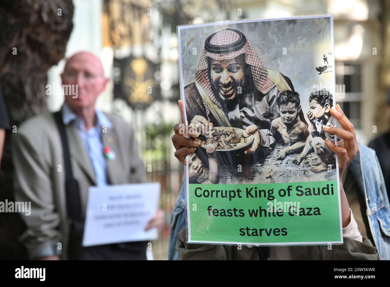 London, England, UK. 17th Aug, 2024. A protester holds a sign saying ...