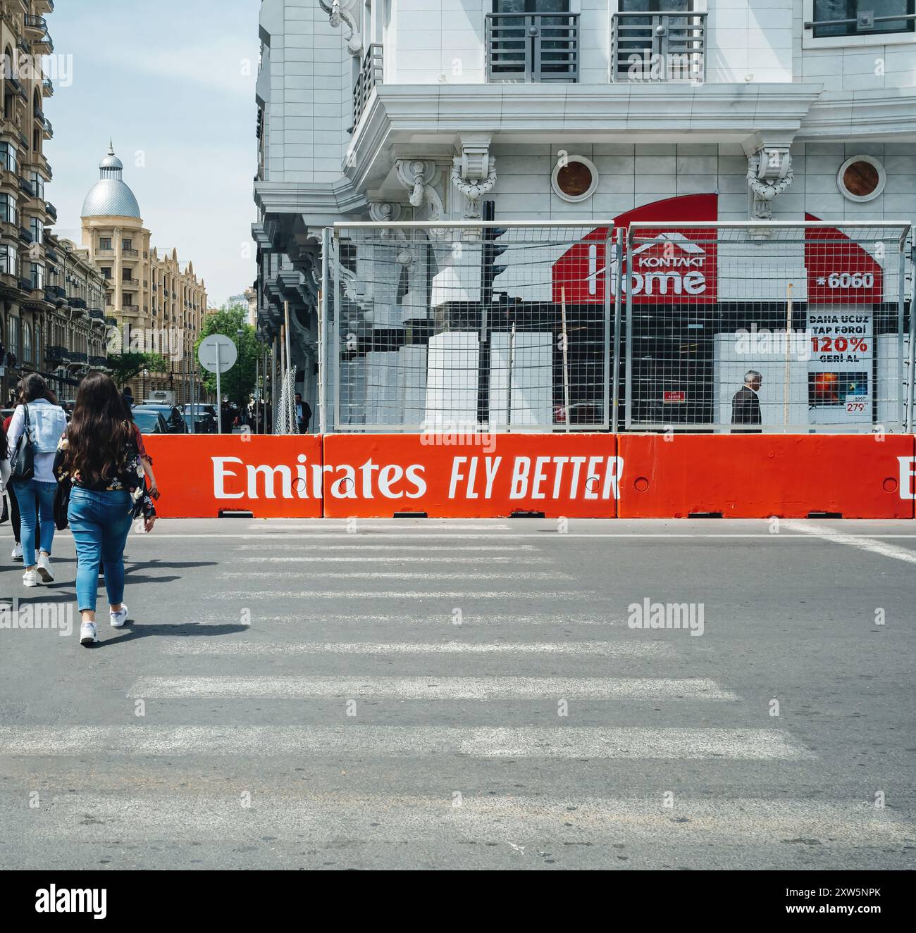 Baku, Azerbaijan - May 3, 2019: An elegant Azeri woman crosses the ...