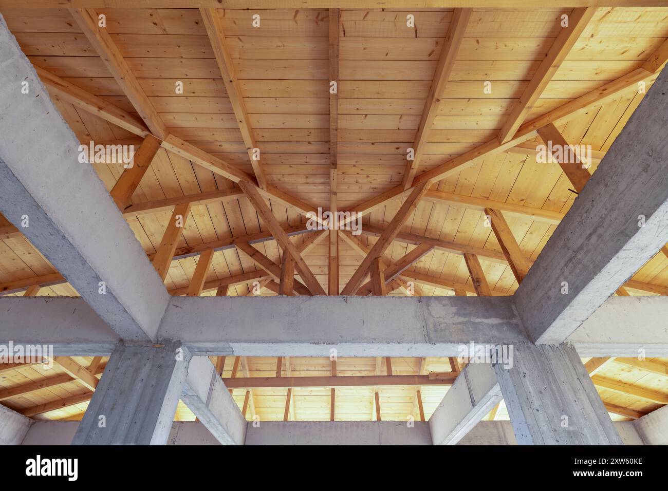 Wooden roof ceiling detail. Interior view of a wooden roof structure ...