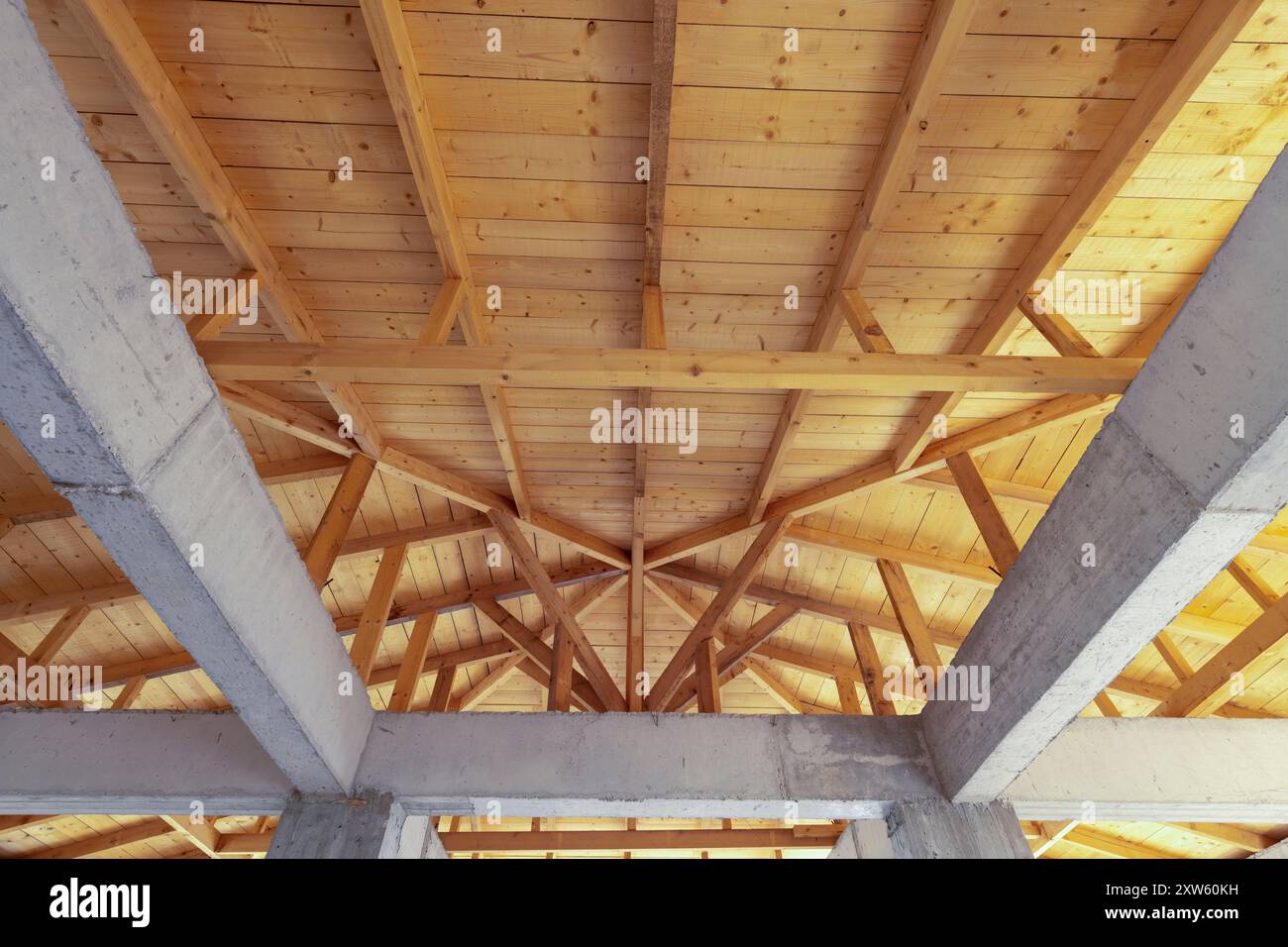 Wooden roof ceiling detail. Interior view of a wooden roof structure ...