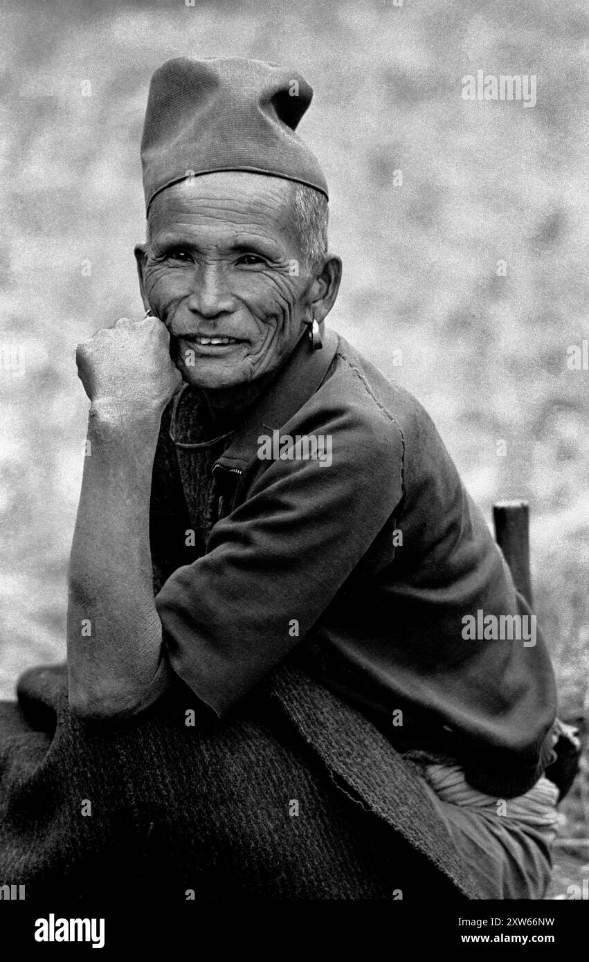A Gurung man wears home spun garments in the middle hills of Nepal on ...