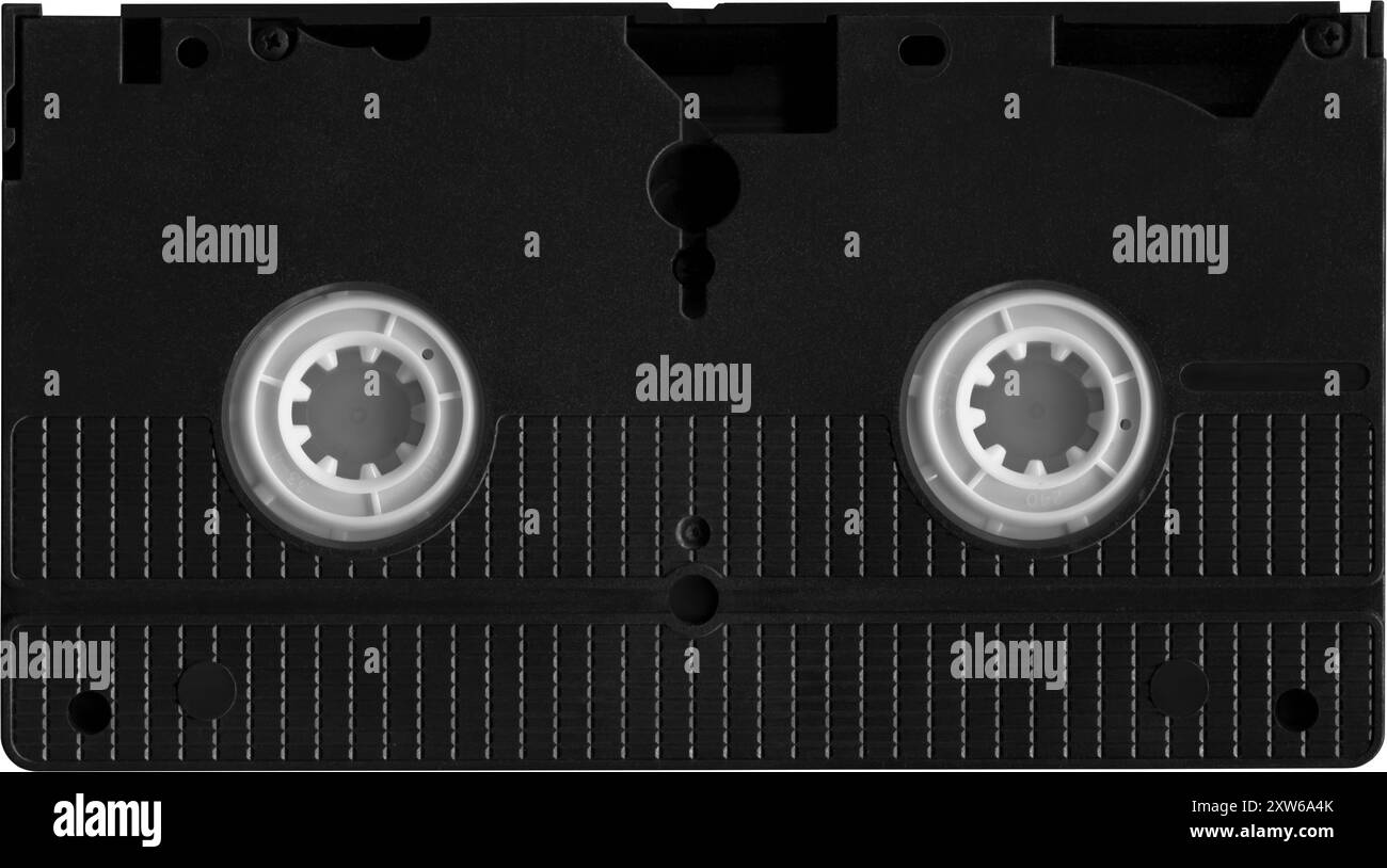 a close-up view of the backside of a vintage VHS cassette. The plastic ...