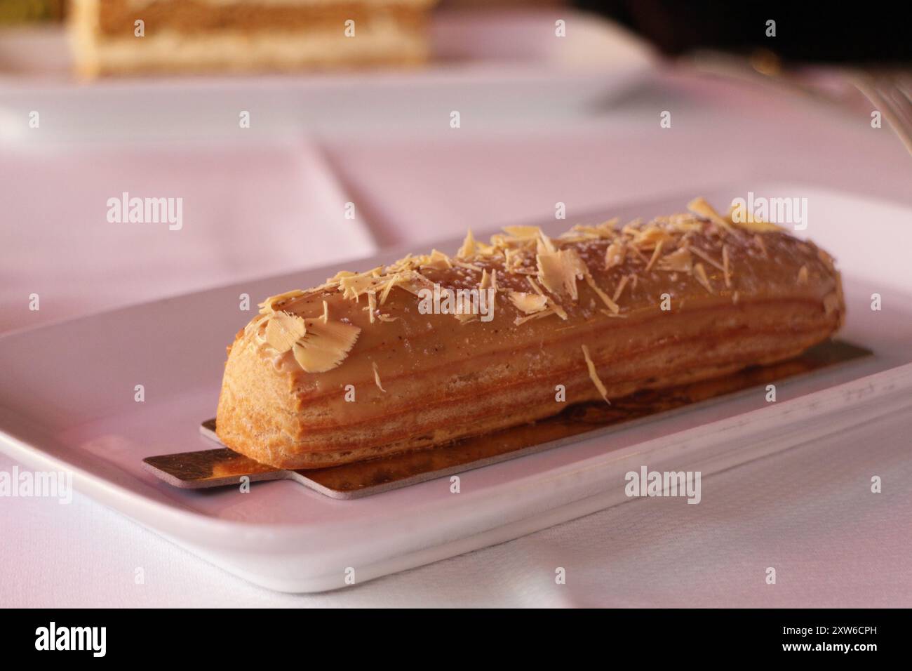 French dessert: coffee eclair in Paris, France Stock Photo - Alamy