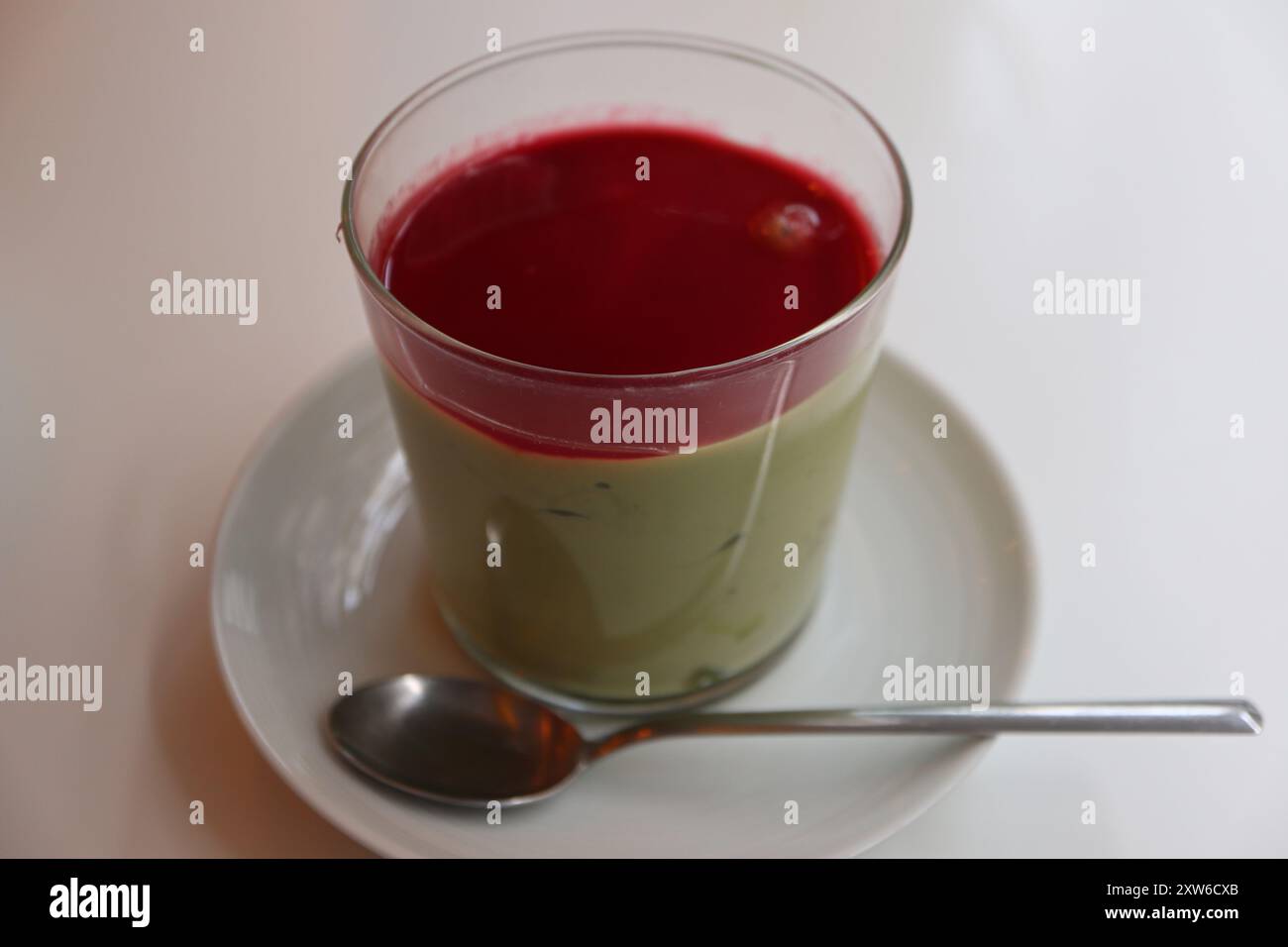 Matcha tea mousse with cherry sauce in Paris, France Stock Photo - Alamy