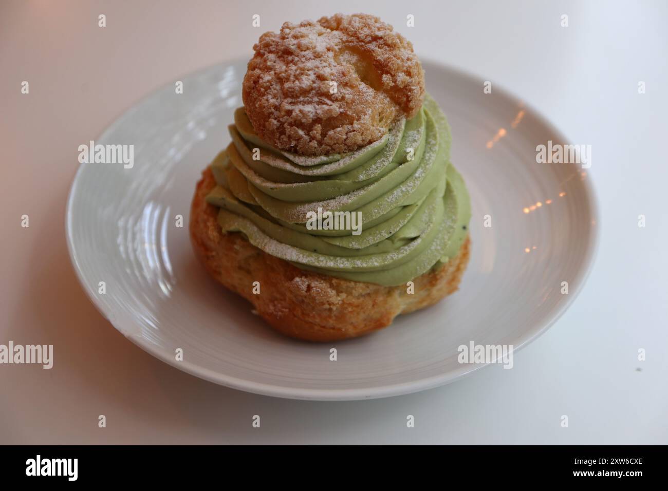 Matcha cream puff in Paris, France Stock Photo - Alamy