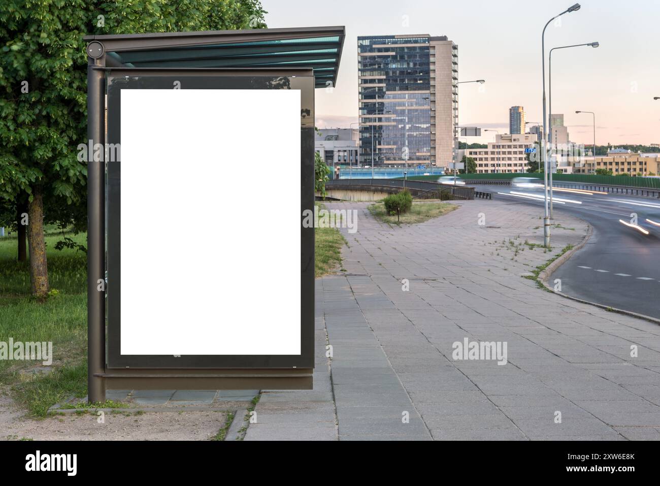 Blank White Bus Stop Vertical Poster Billboard Mockup In Front Of City ...