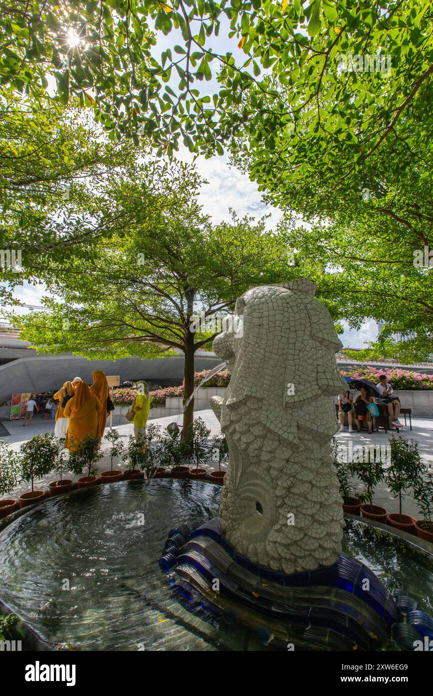 Back view of Merlion cub statue fountain sprouting water, a popular ...