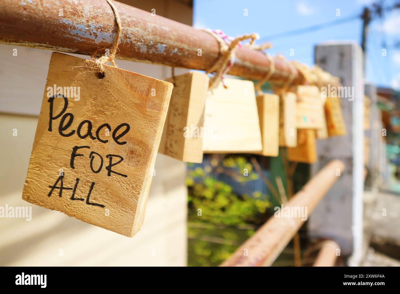 Wooden Plaque with a Greeting Hanging on the Bridge Railing Stock Photo ...