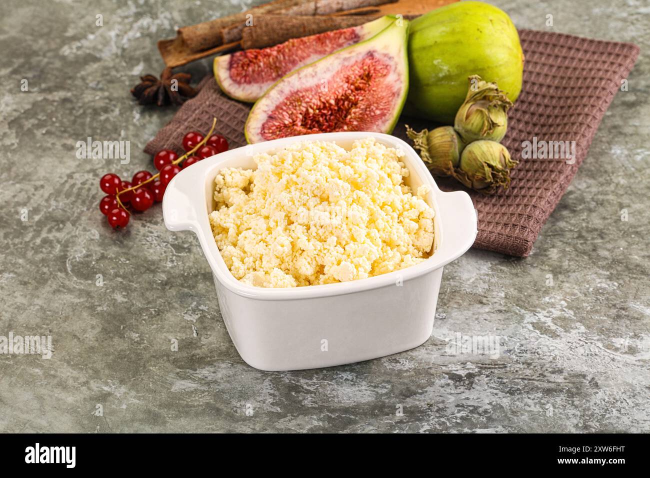 Delicous sheep cottage cheese curd served fig Stock Photo - Alamy