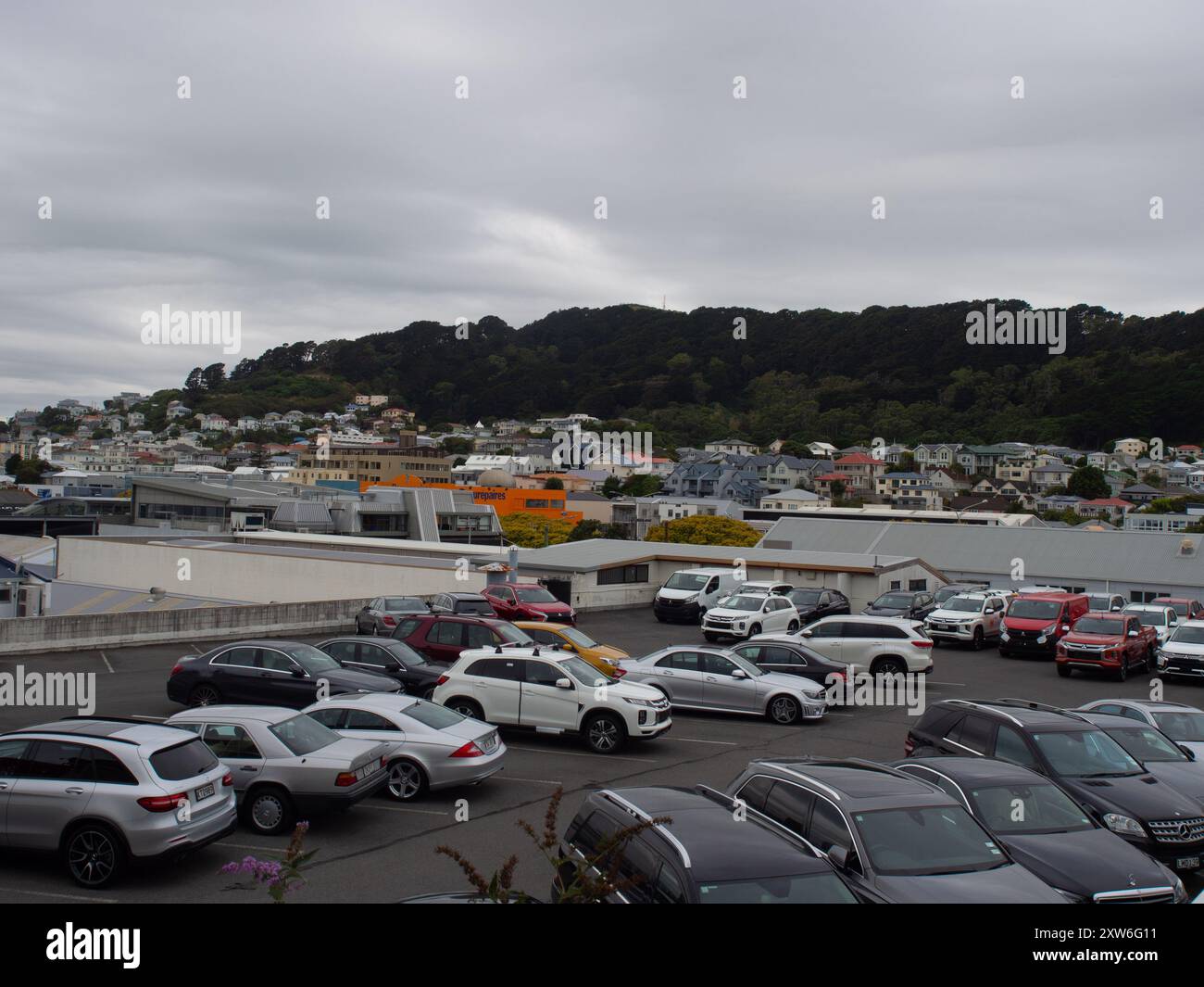 Cars Parked On A Building Roof Stock Photo - Alamy