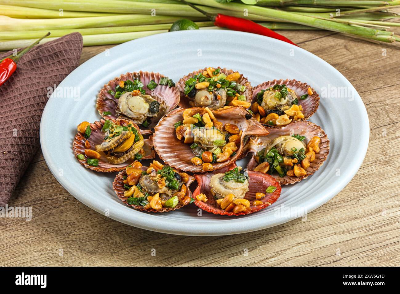 Baked scallops with scalion oil and green onion Stock Photo - Alamy
