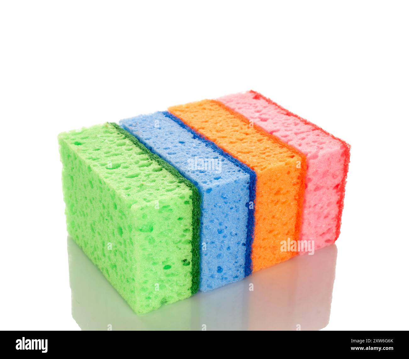 Four kitchen sponges, macro, isolated on white background Stock Photo ...