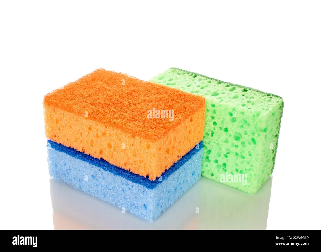 Three kitchen sponges, macro, isolated on white background Stock Photo ...