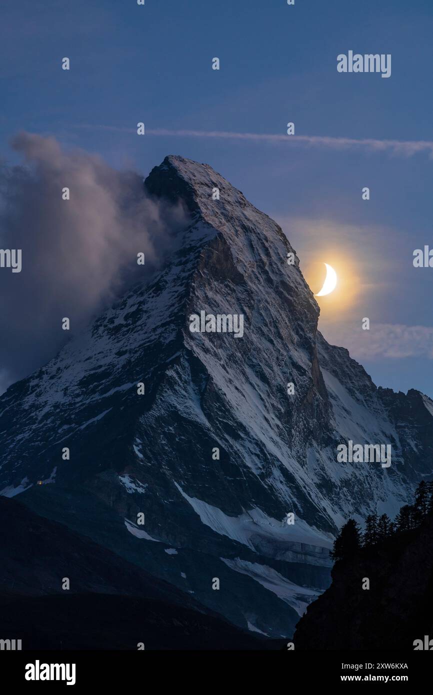 Night view of Matterhorn with crescent moon, Zermatt, Valais ...