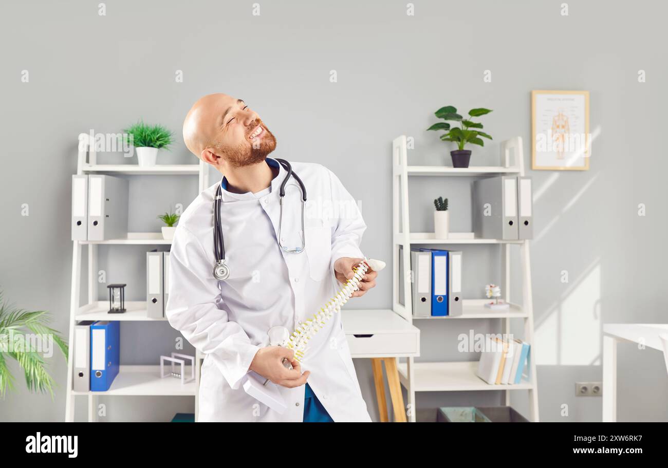 Happy doctor dancing in office hi-res stock photography and images - Alamy