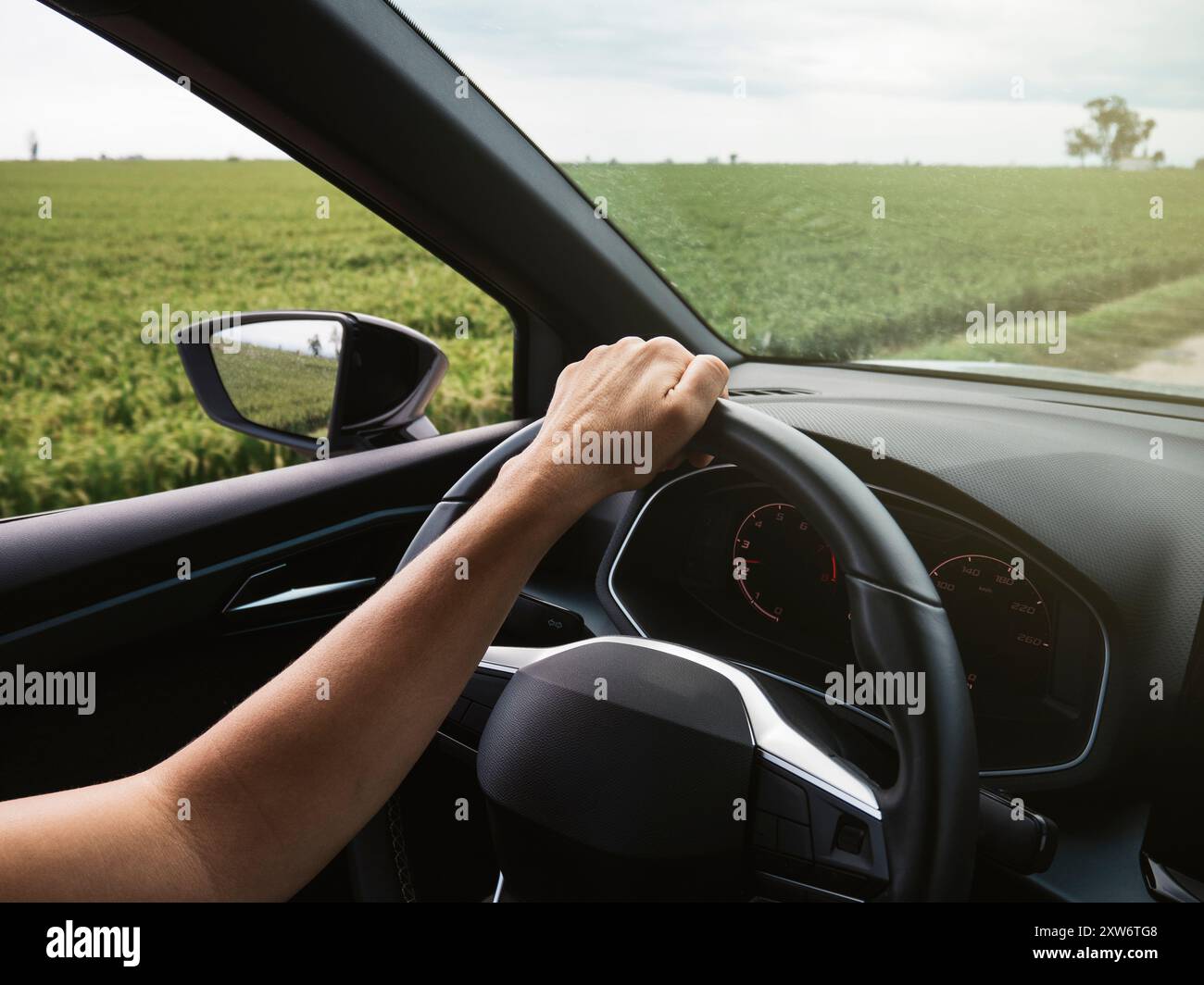 Car driving through green fields hi-res stock photography and images ...
