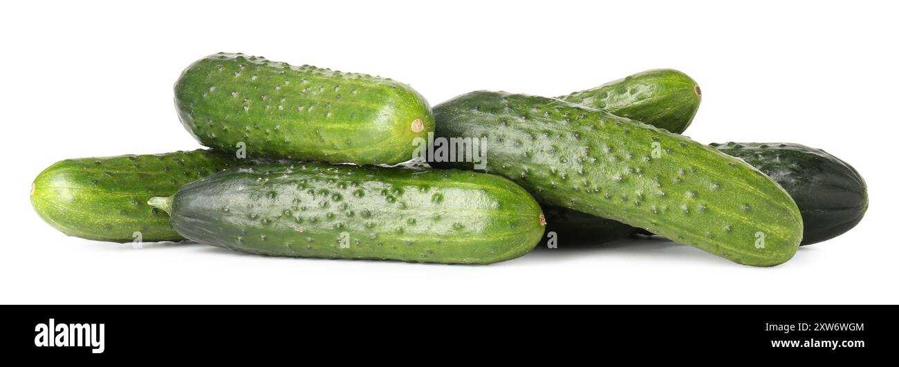 Pile of fresh cucumbers isolated on white Stock Photo - Alamy