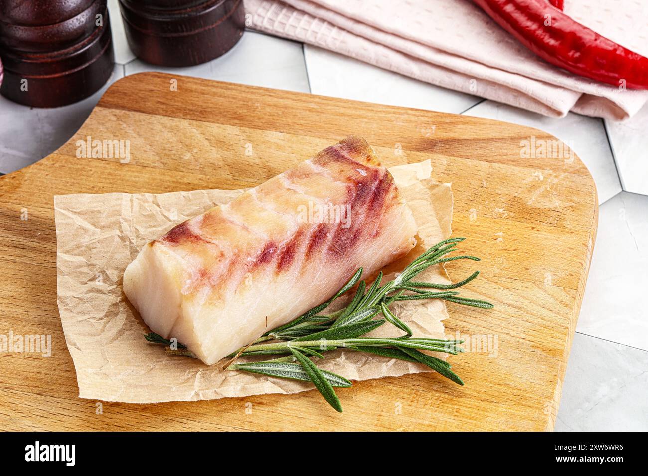 Raw cod fish steak piece for cooking Stock Photo - Alamy