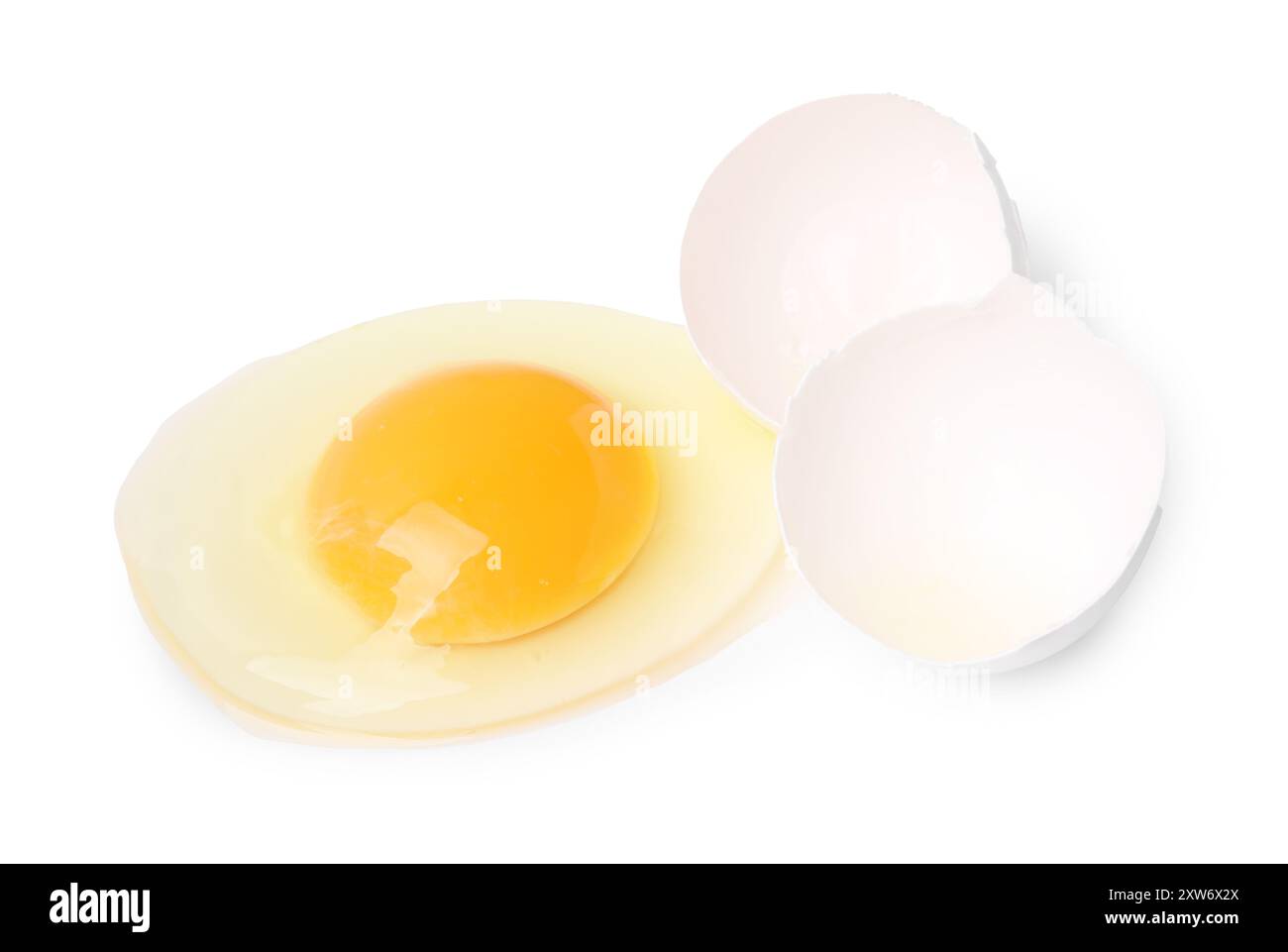 Broken raw egg and shell isolated on white Stock Photo - Alamy