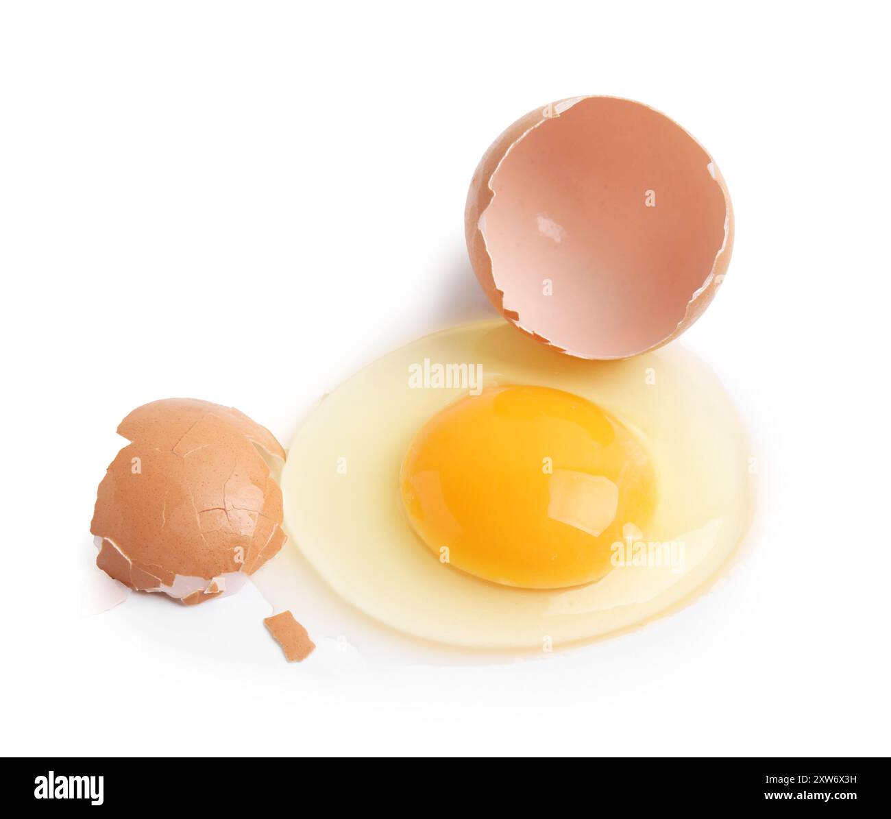Broken raw egg and shell isolated on white Stock Photo - Alamy