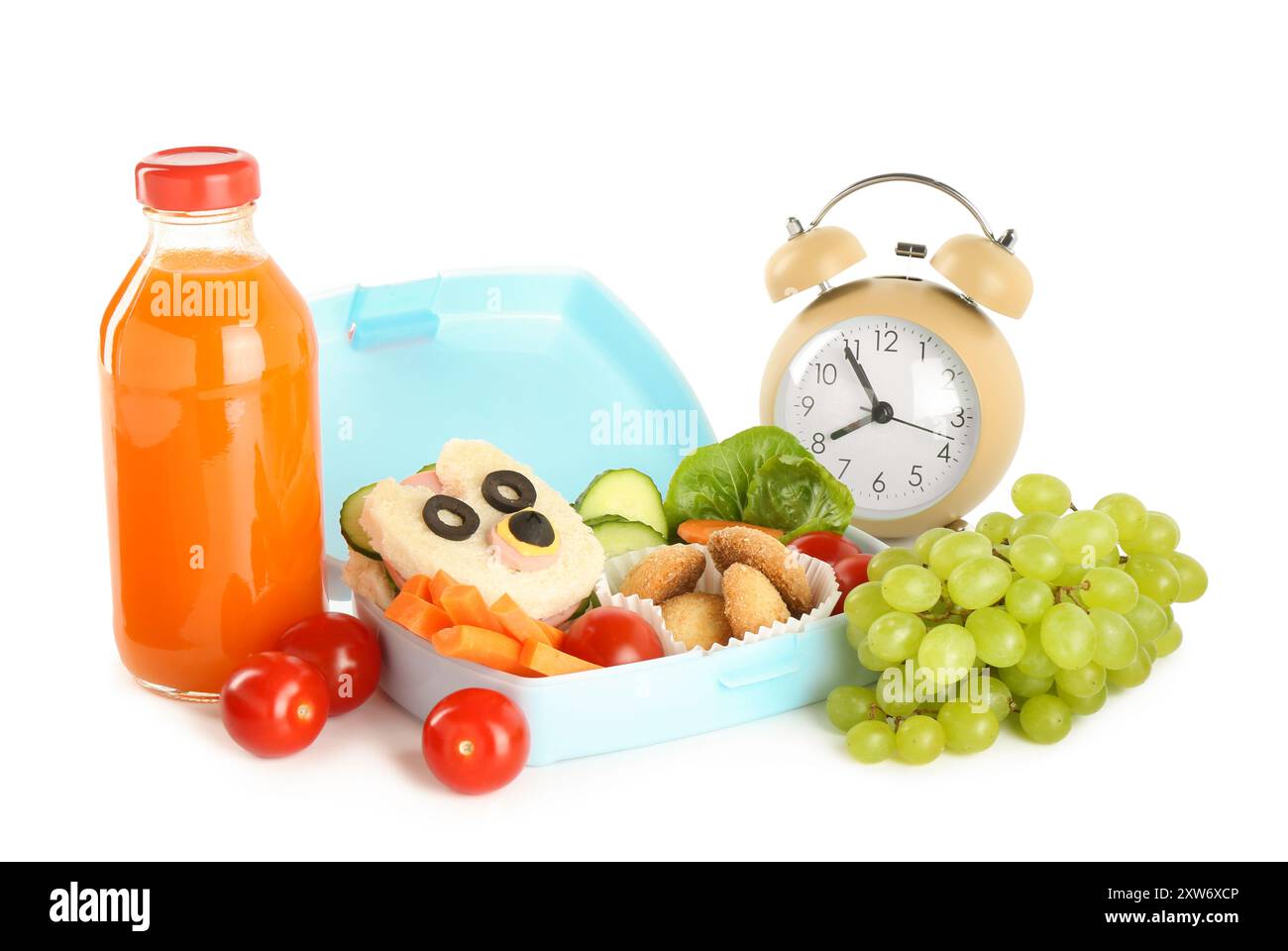 Lunch box with snacks, bottle of juice and alarm clock isolated on ...
