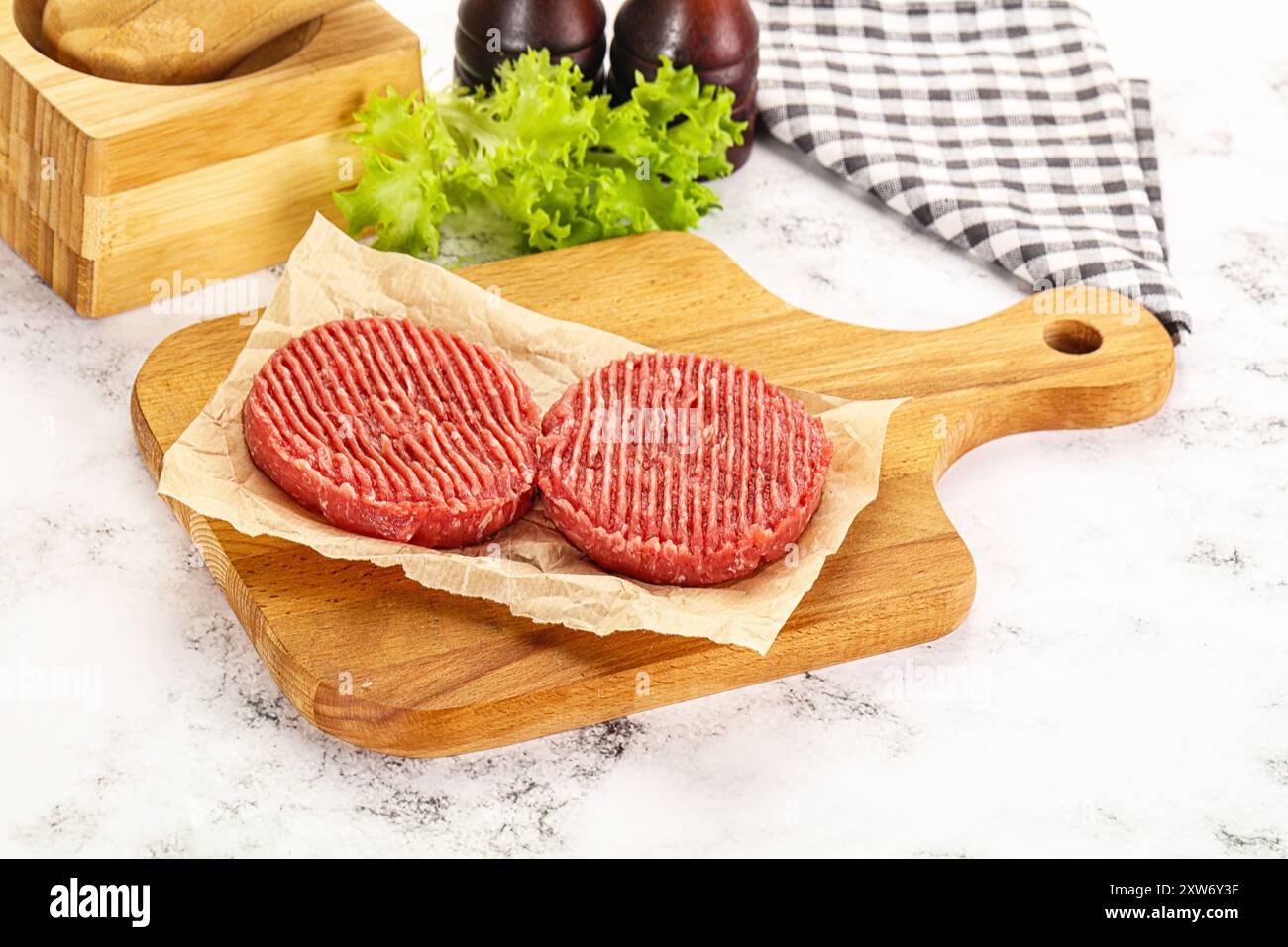 Raw beef burger cutlet minced meat for grill Stock Photo - Alamy