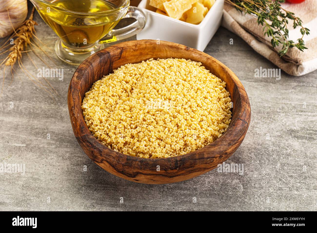 Italian cuisine - dry stelline pasta for bowl Stock Photo - Alamy