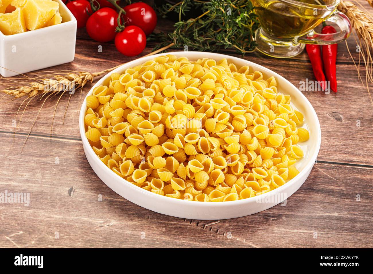 Italian cuisine - dry conchiglie shell pasta Stock Photo - Alamy