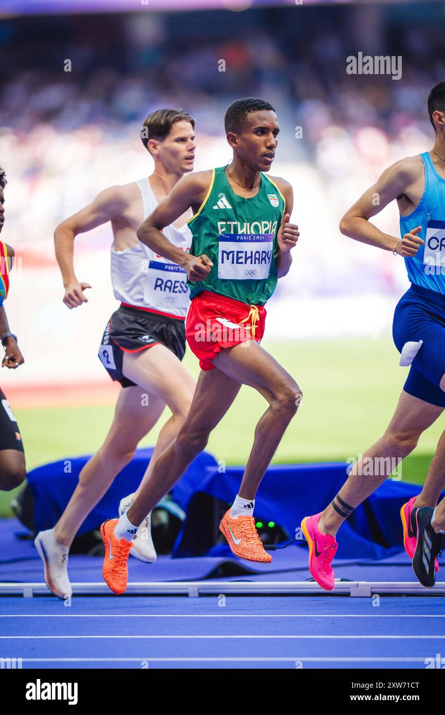 Biniam Mehary participating in the 5000 meters at the Paris 2024 ...