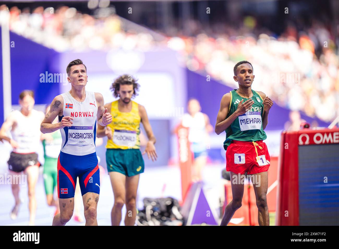 Biniam Mehary participating in the 5000 meters at the Paris 2024 ...